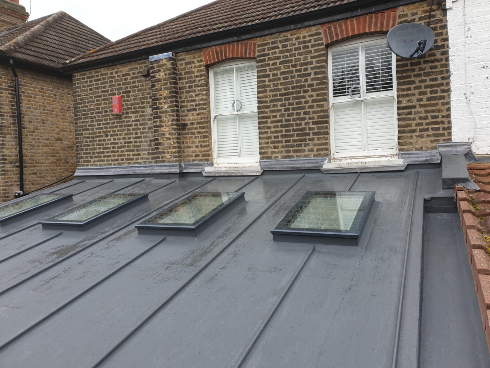 Choosing the Best Flat Roofing System - SM Roofline
